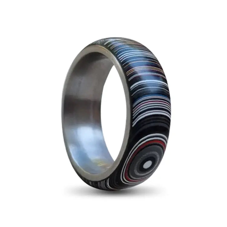 Fordite Focus Titanium Ring with an Outer Layer of Fordite